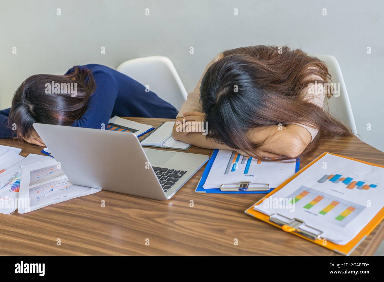 Office employees taking short break in office room Stock Photo - Alamy