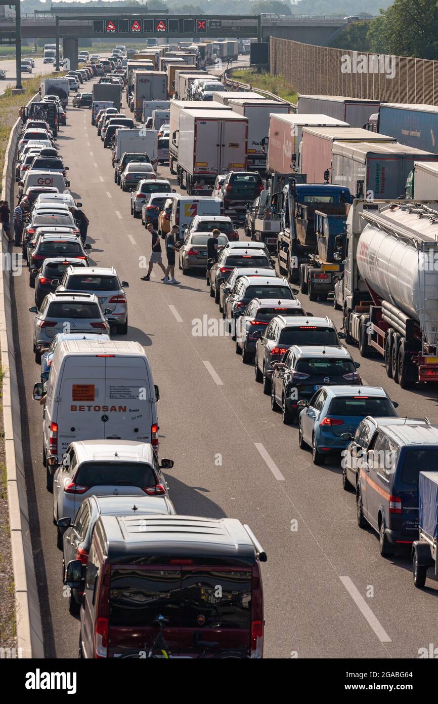 Munich, Germany. 30th July, 2021. Cars and trucks are stuck in a ...