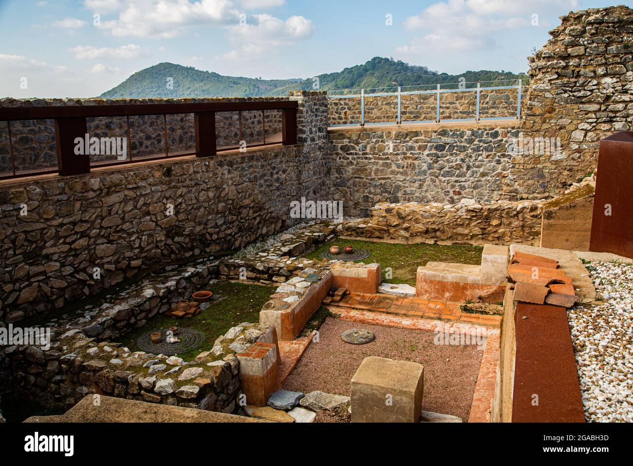 Castle, walls and restoration excavations, with samples of foundations ...