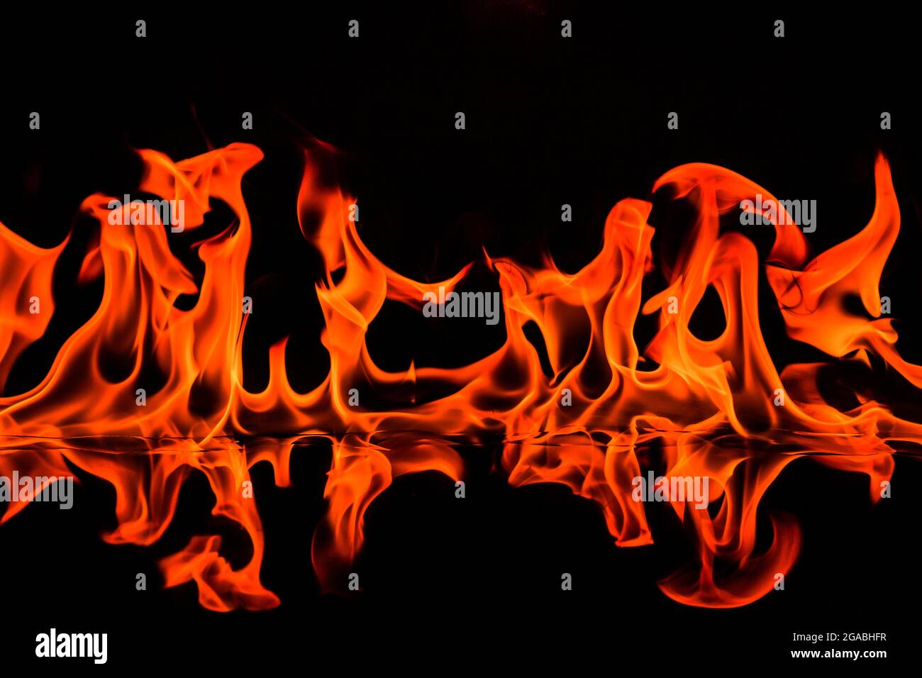Red Fire flames on black background Stock Photo - Alamy