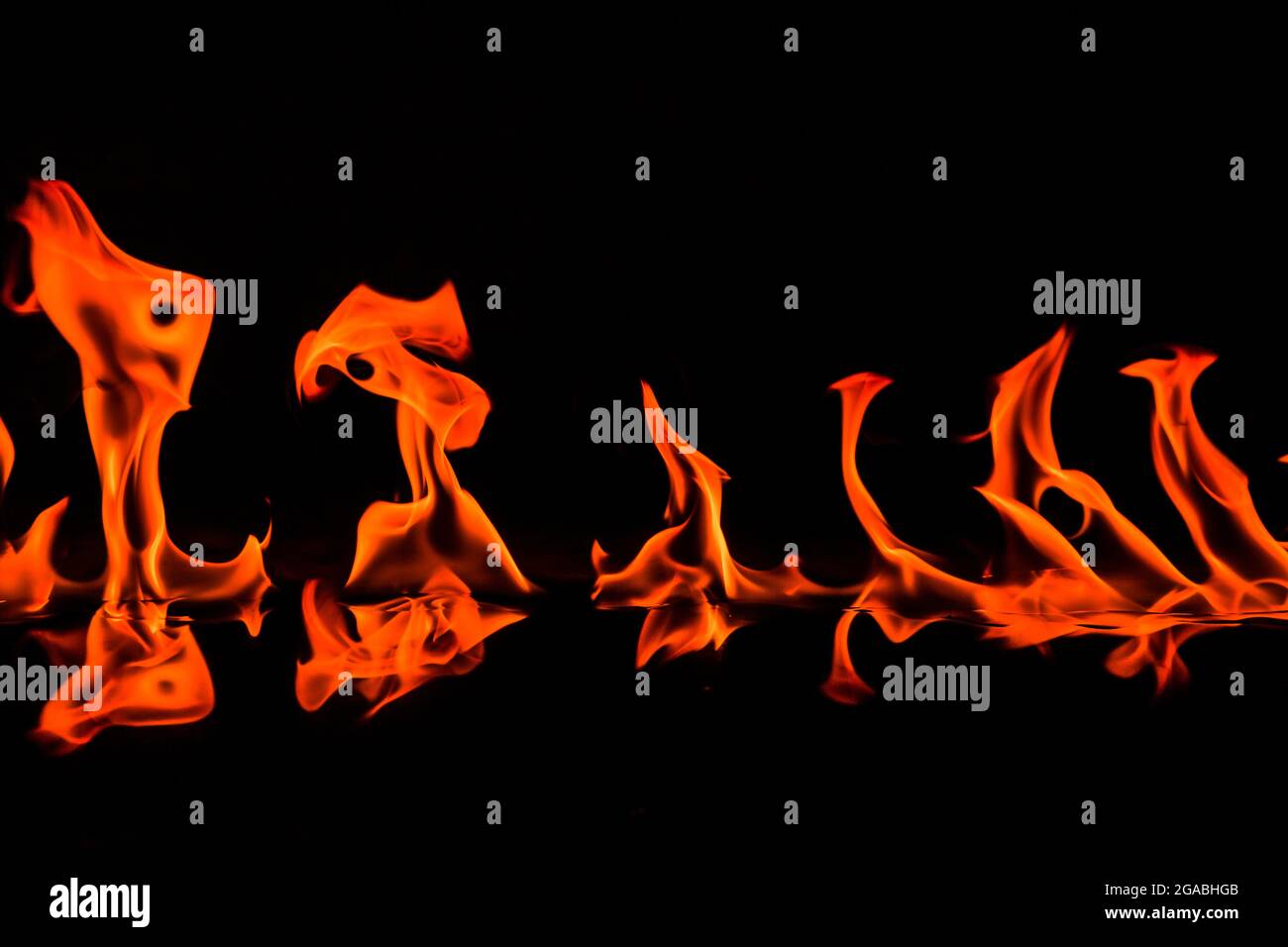Red Fire flames on black background Stock Photo - Alamy