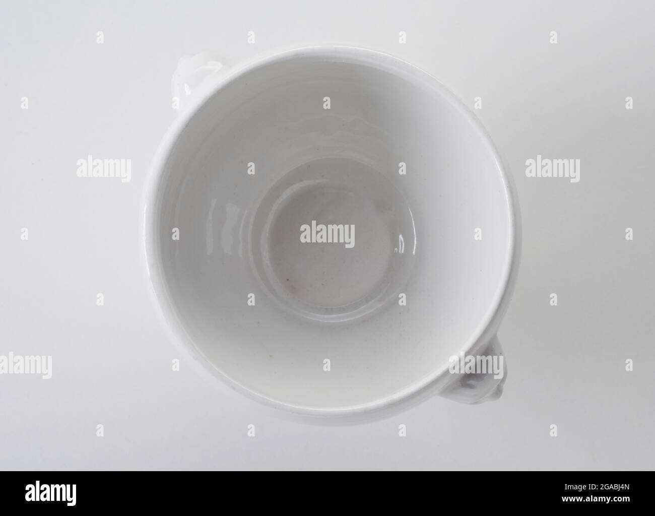 Top view of empty deep round white ceramic soup tureen bowl with ...