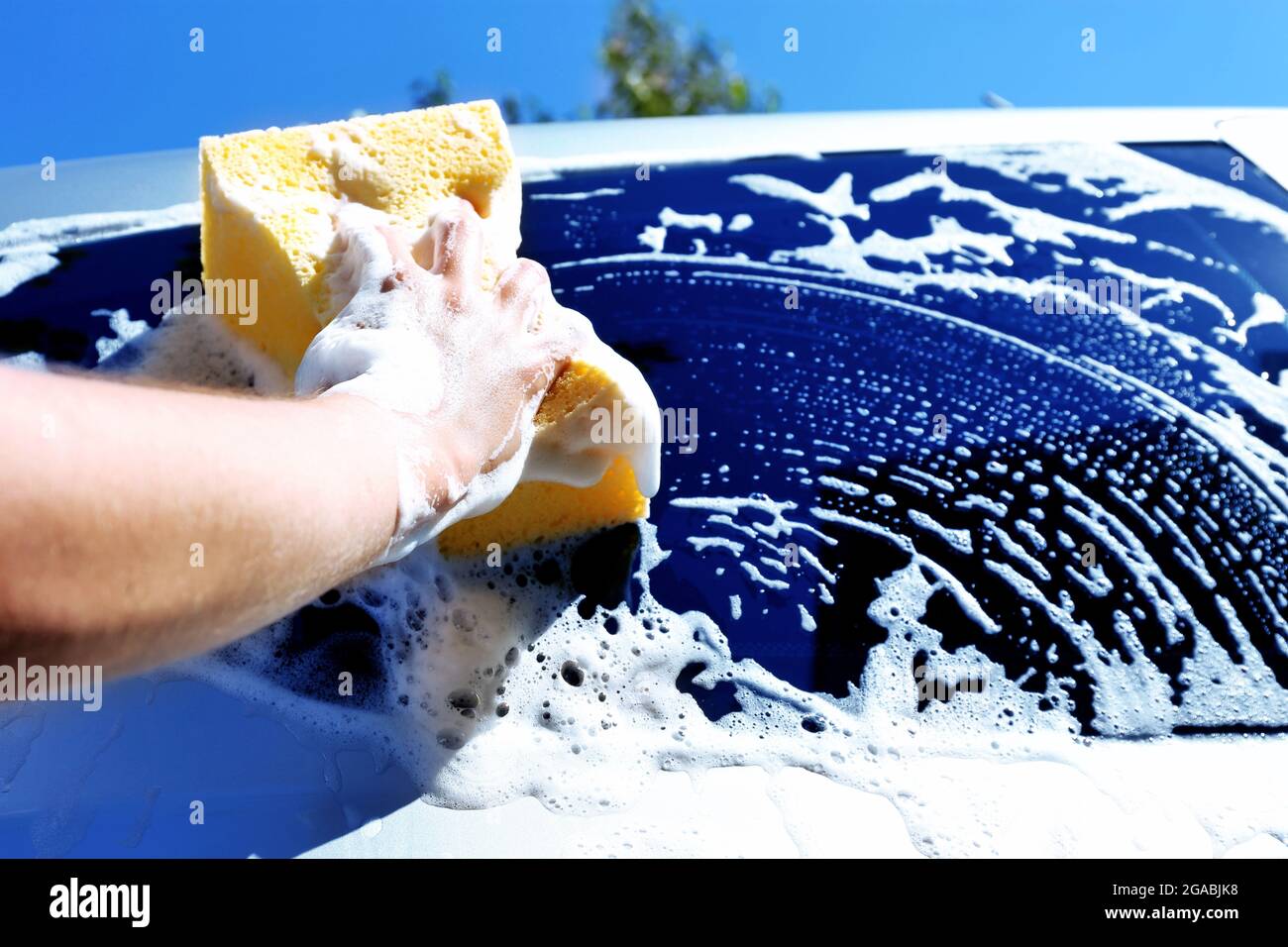 Hand washing car window Stock Photo - Alamy