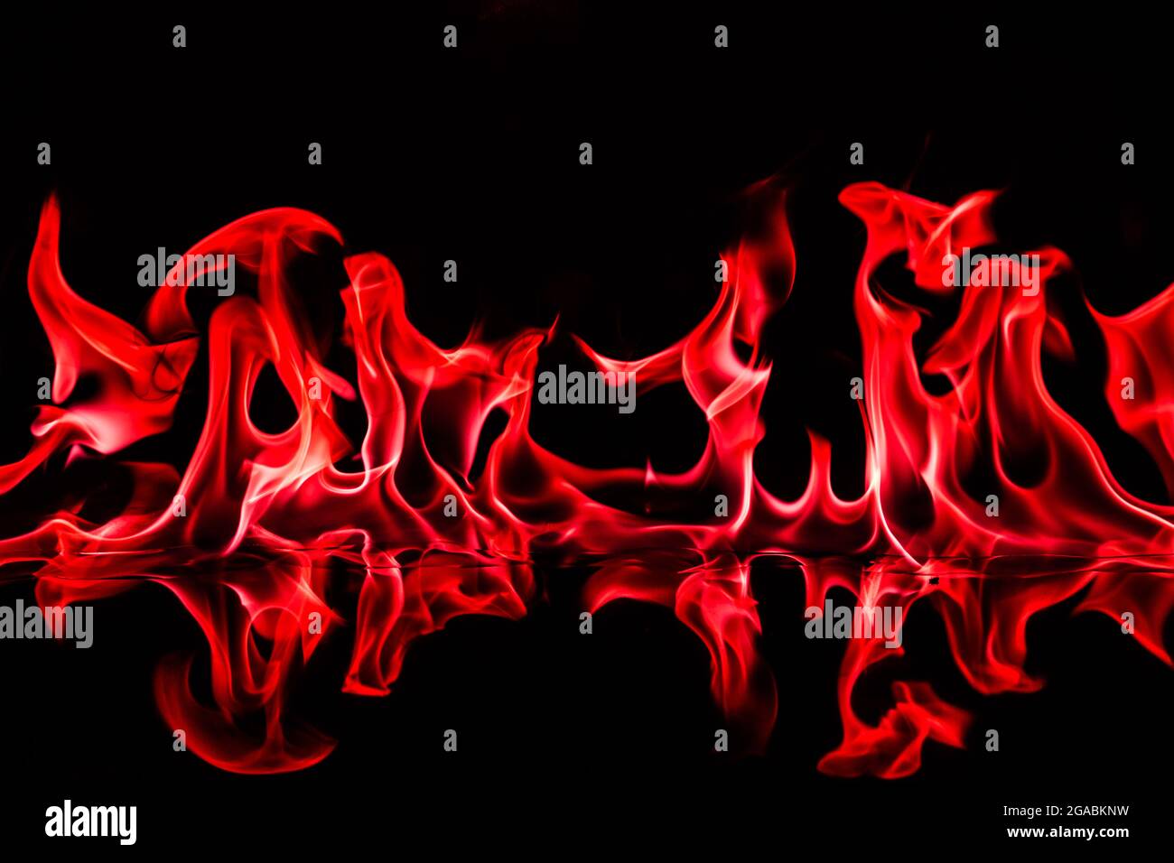 Red Fire flames on black background Stock Photo - Alamy