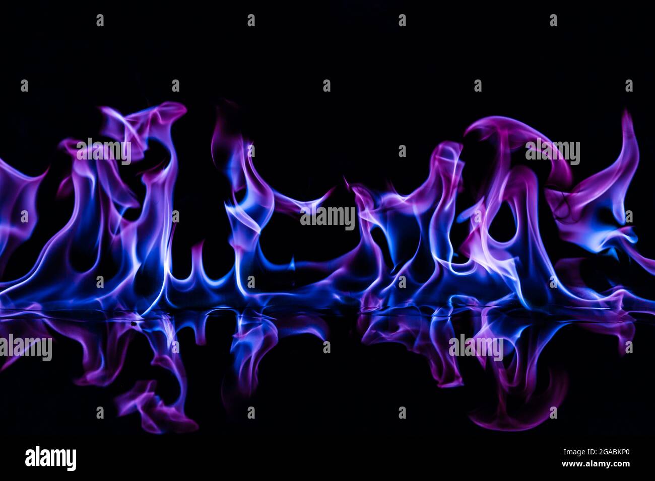 Blue color fire flames on black background Stock Photo - Alamy