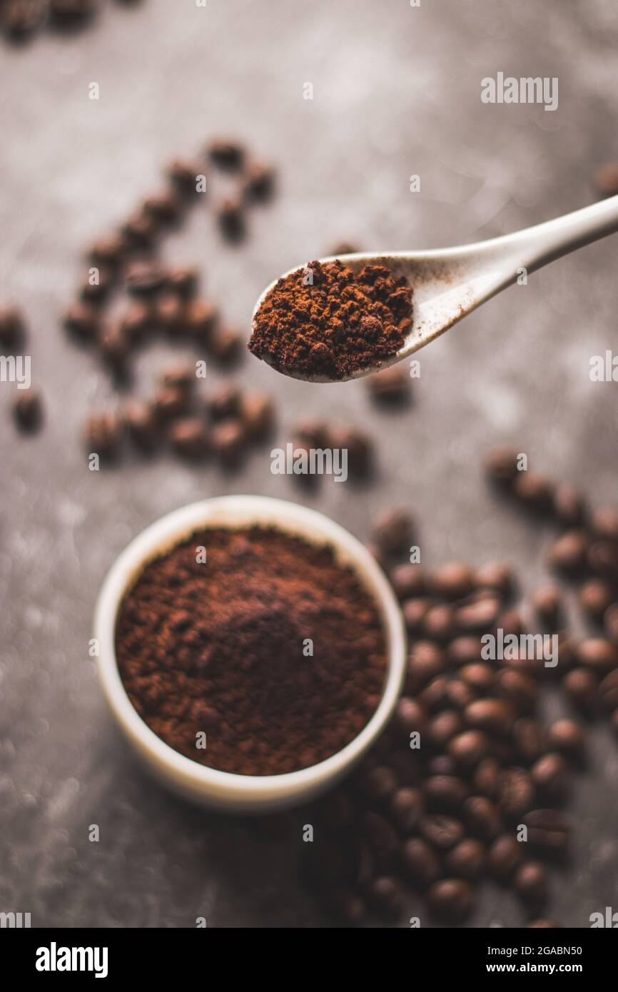 Coffee beans and powder with textured background stock image Stock ...