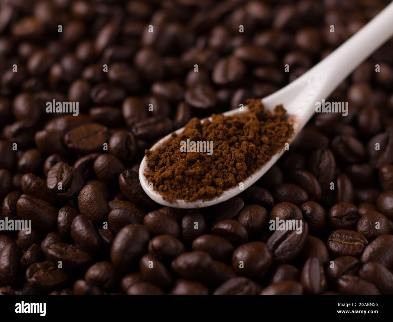 Coffee beans and powder with textured background stock image Stock ...