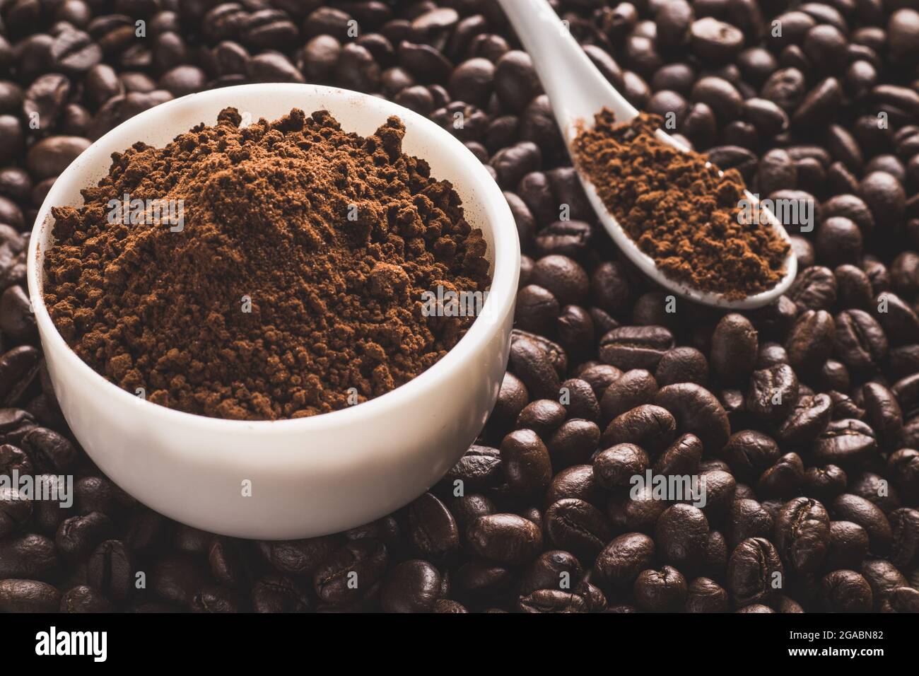 Coffee beans and powder with textured background stock image Stock ...