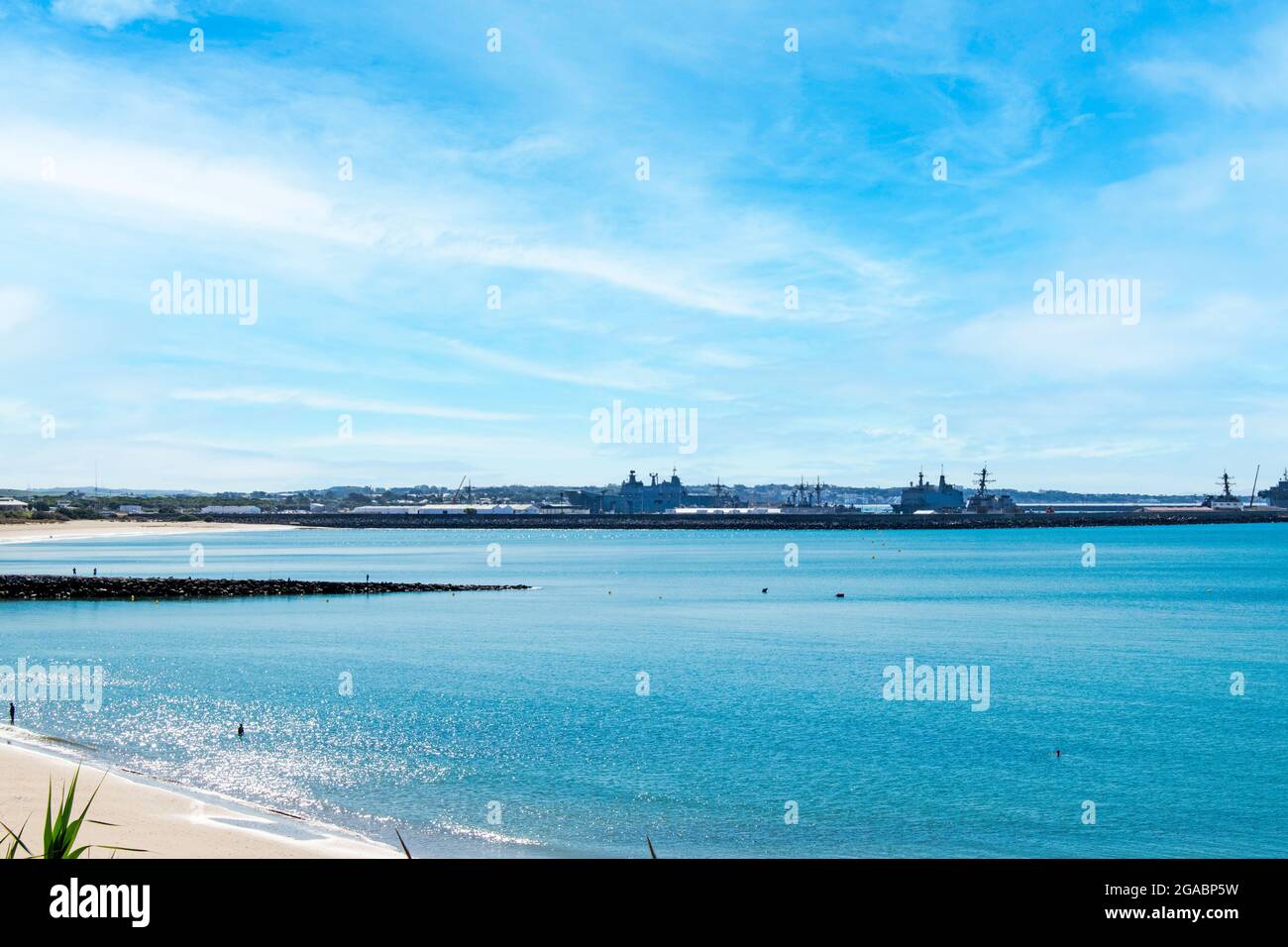 Rompidillo beach with the naval base in the background in Rota, Cadiz ...