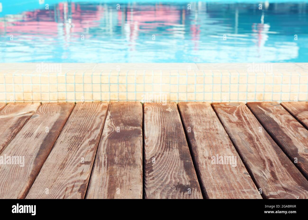 Rustic wooden floor near swimming pool background Stock Photo - Alamy