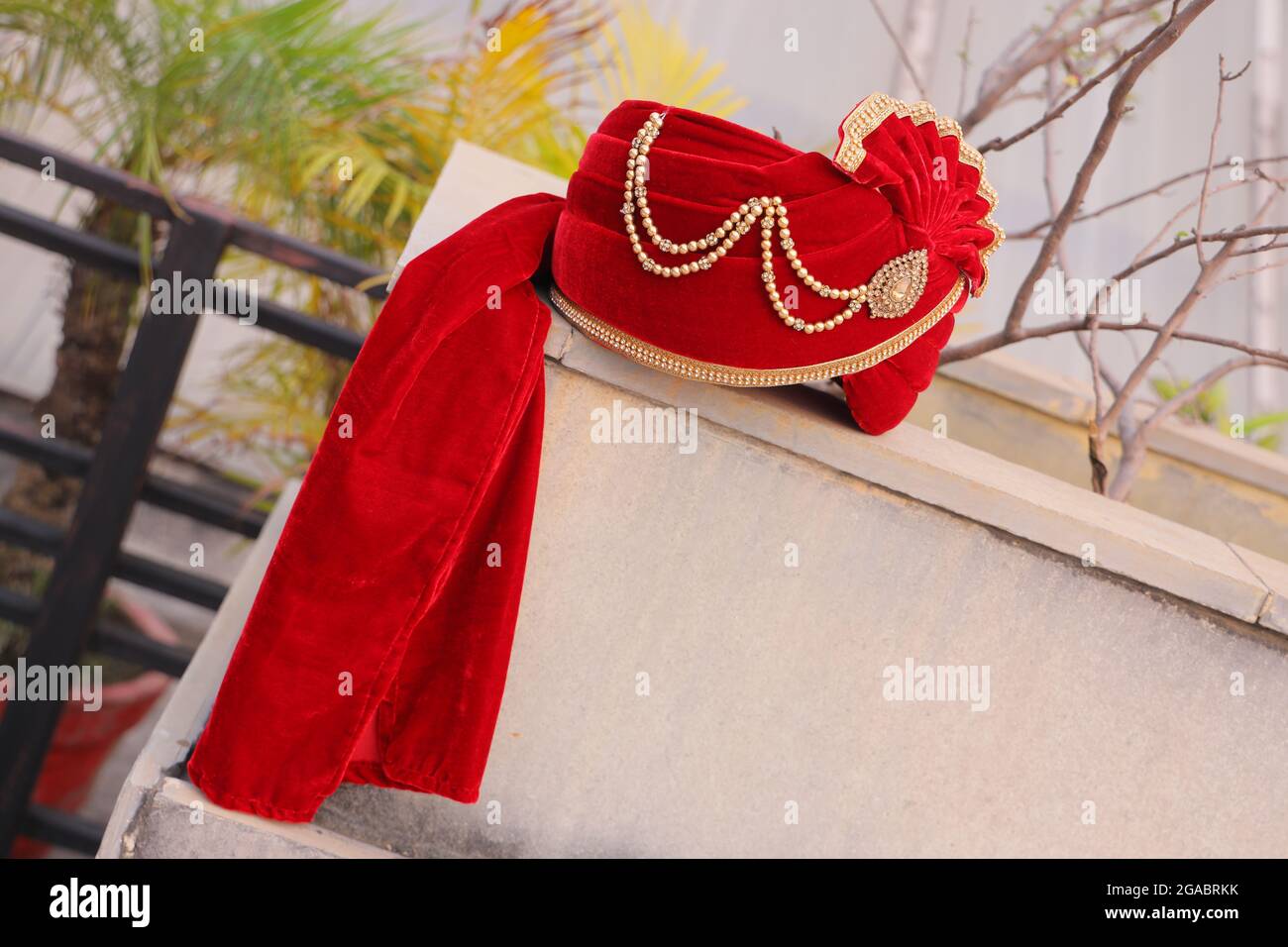 Maroon Rajasthani Tuban for Groom Indian Safa in White Background Stock ...