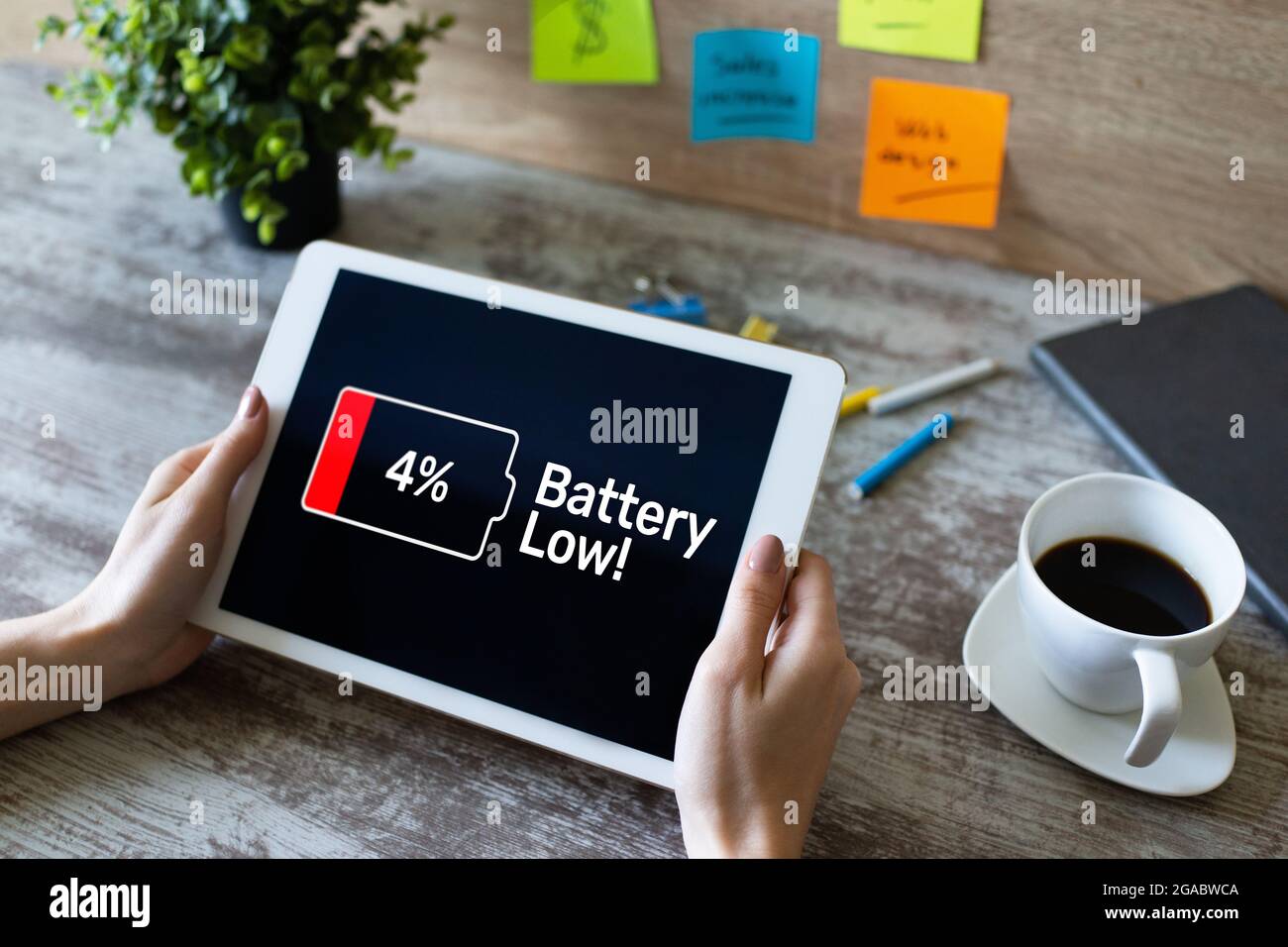 Battery low message on mobile device screen. Internet and technology ...