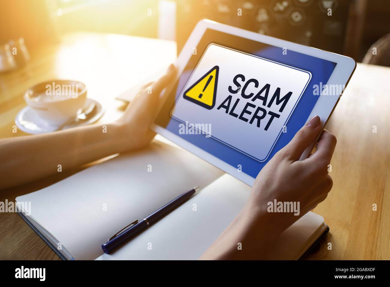 Scam alert detecting warning. Notification on device screen Stock Photo ...