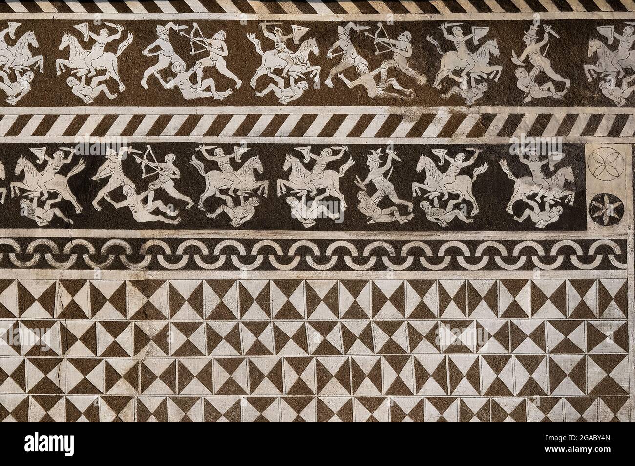 Action-packed 16th century Renaissance sgraffito friezes on the brown ...