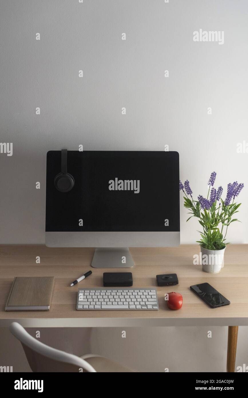Top view of a clean and neat workspace at night Stock Photo - Alamy