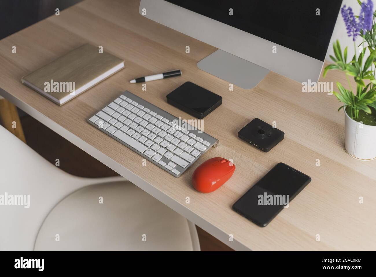 Top view of a clean and neat workspace at night Stock Photo - Alamy