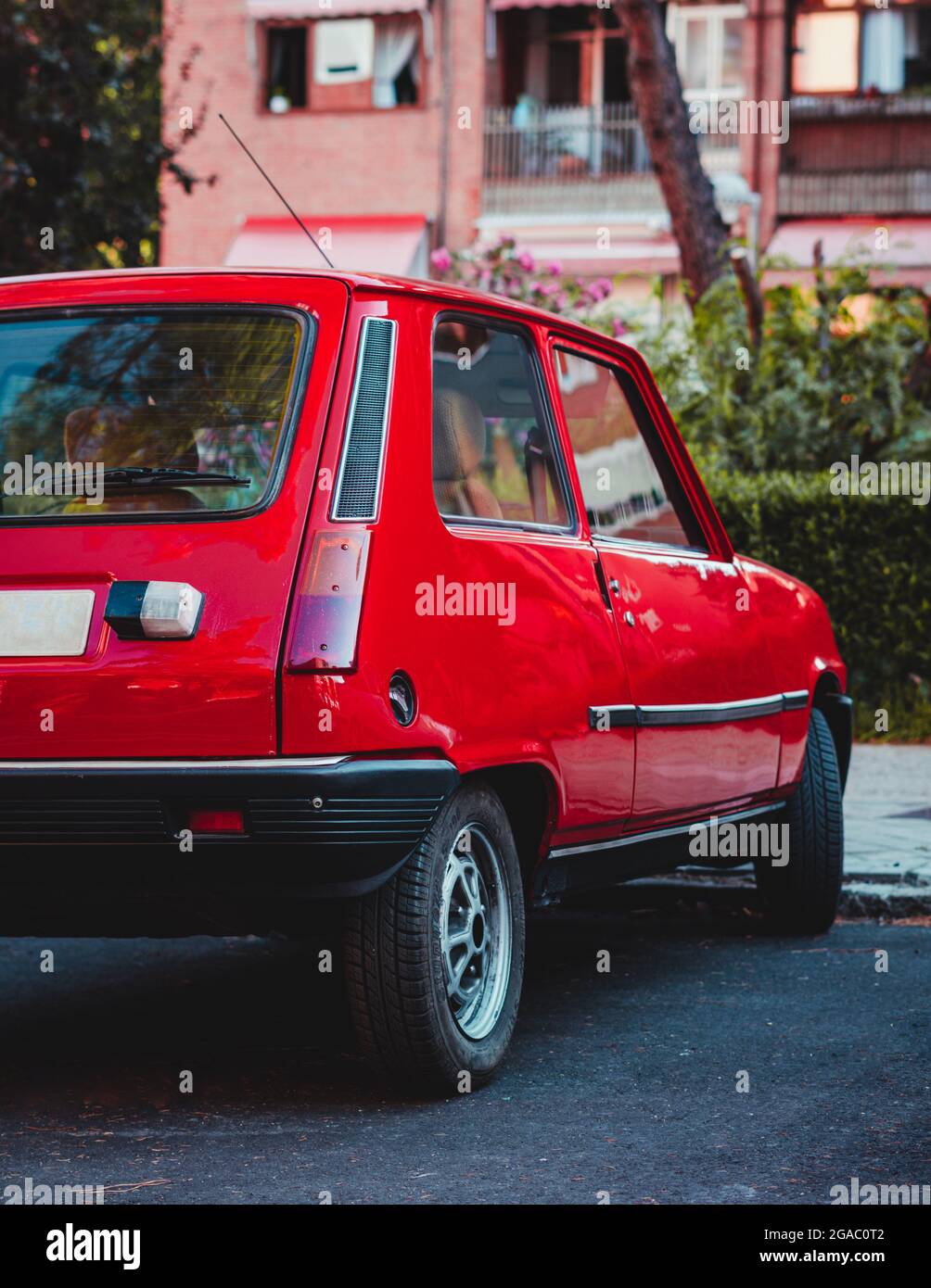 Rear view of a red old car Stock Photo - Alamy