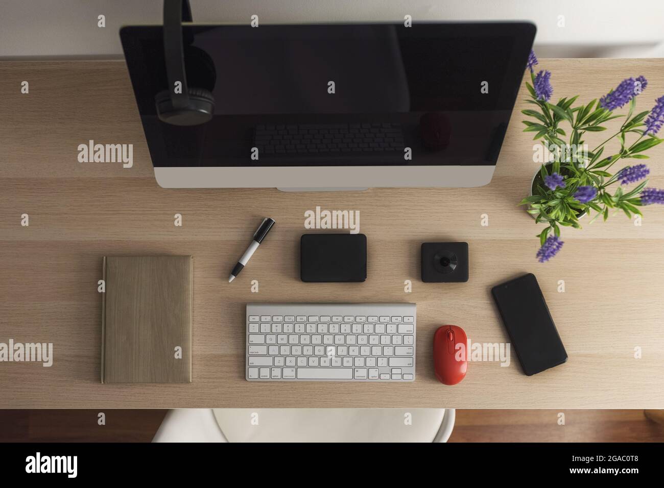 Top view of a clean and neat workspace at night Stock Photo - Alamy