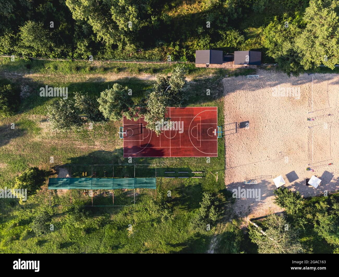 Aerial View of basketball court in a nature environment. Sunset summer ...
