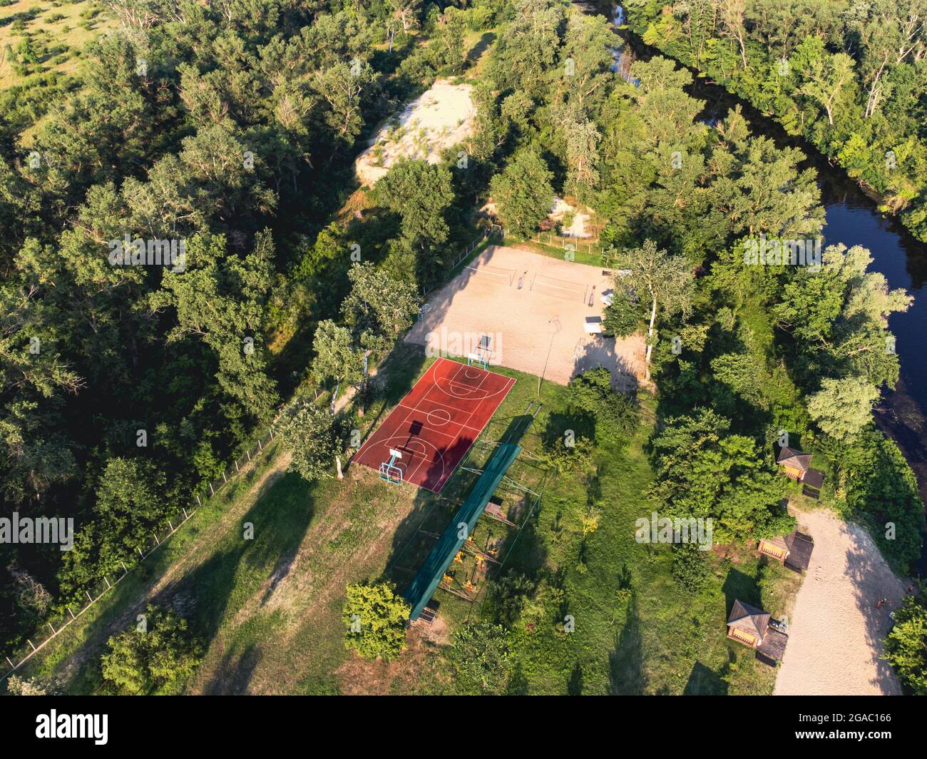 Aerial View of basketball court in a nature environment. Sunset summer ...