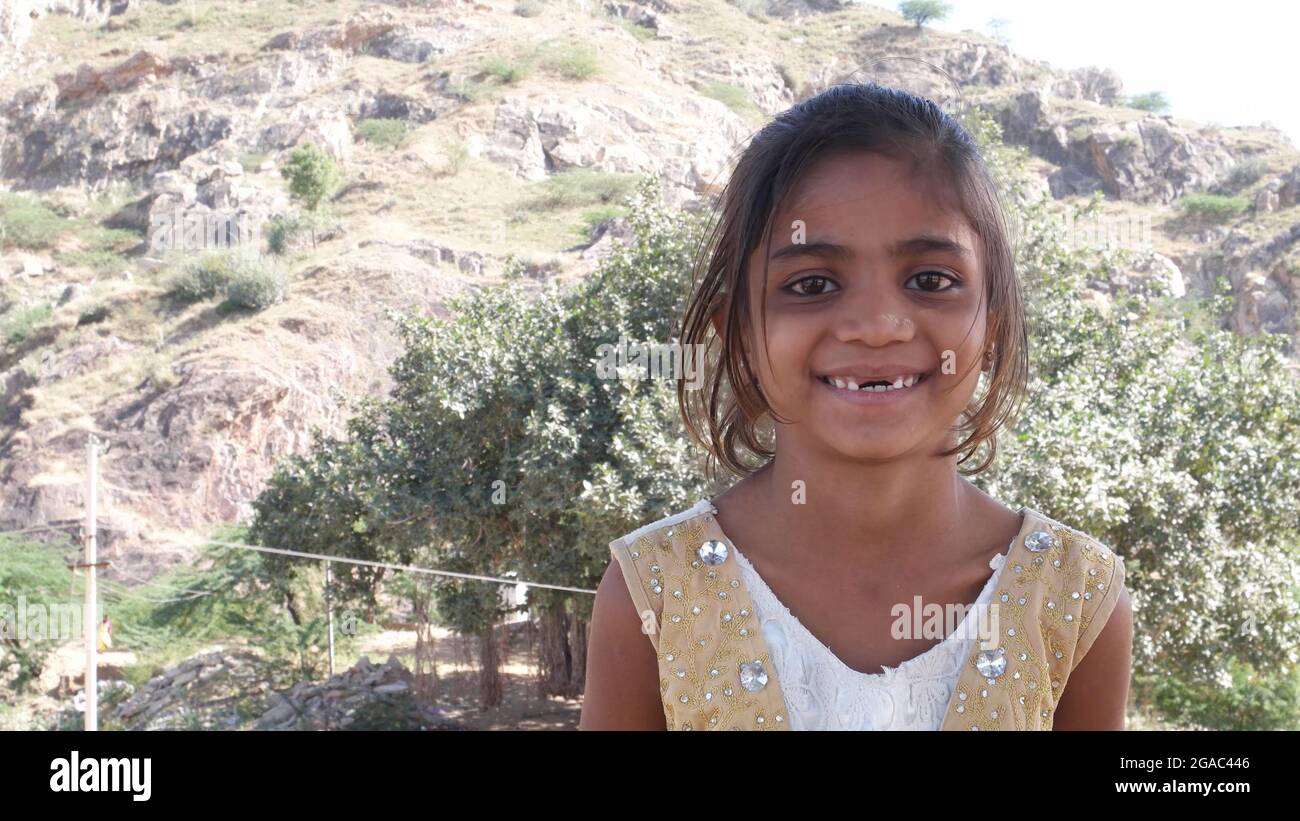 Closeup of a rural girl with a genuine smile on her face, India Stock ...