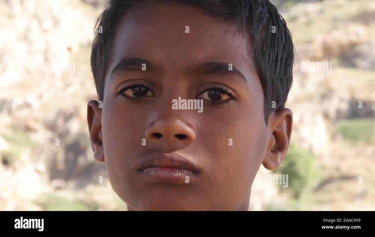 Closeup of the face of a rural boy, India Stock Photo - Alamy