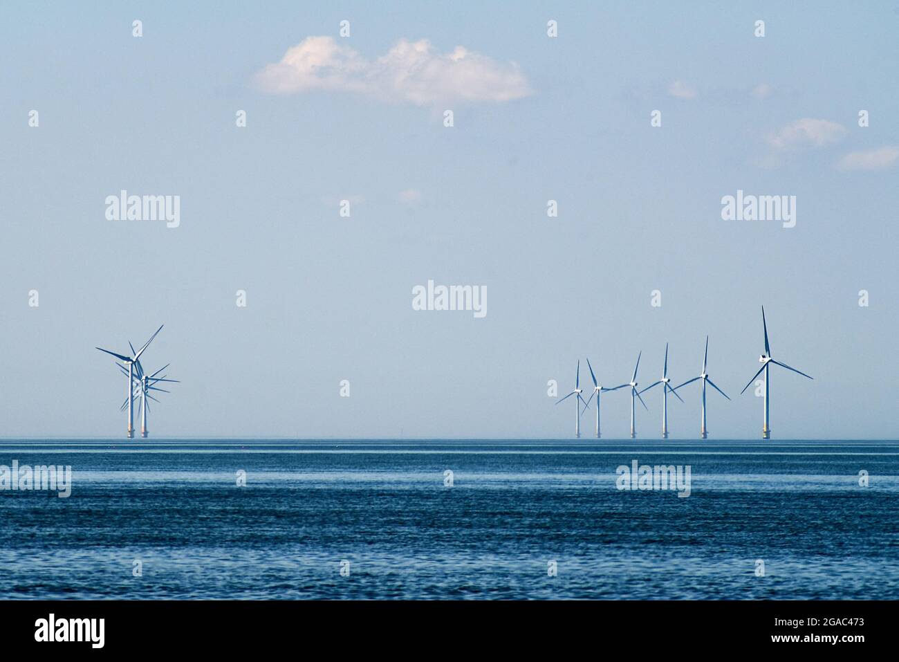 Offshore wind turbines on the horizon Stock Photo - Alamy