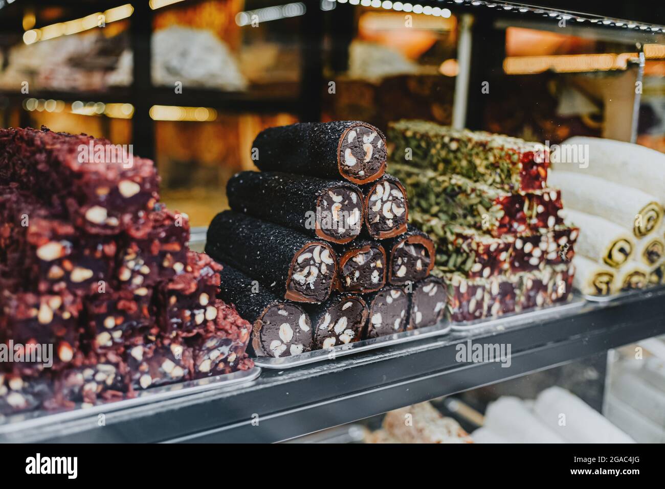 Turkish sweets on plates in the shop window Stock Photo - Alamy