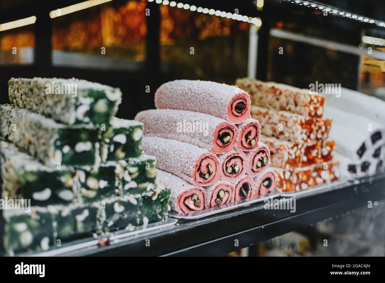 Turkish sweets on plates in the shop window Stock Photo - Alamy