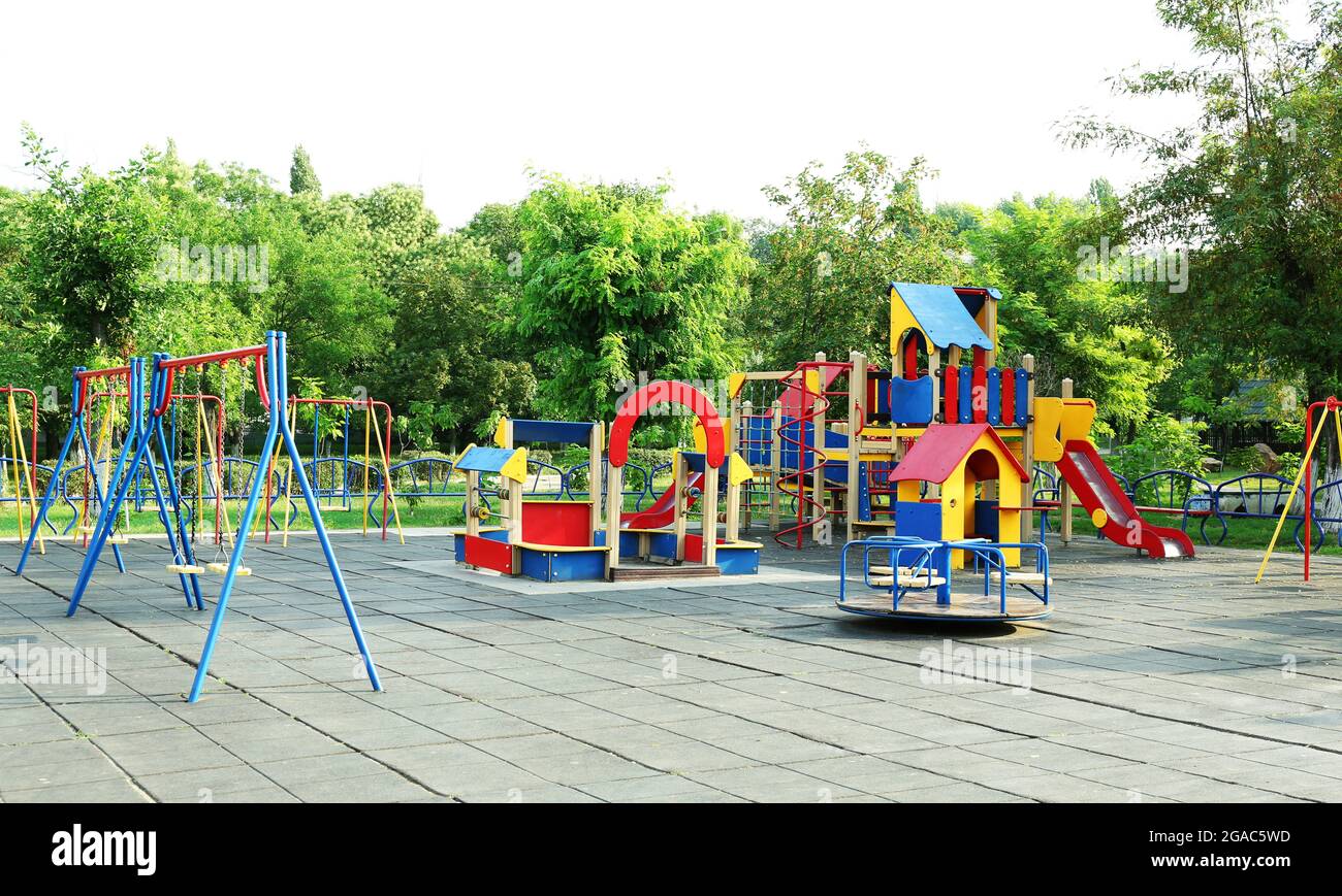 Colorful children playground in park Stock Photo - Alamy