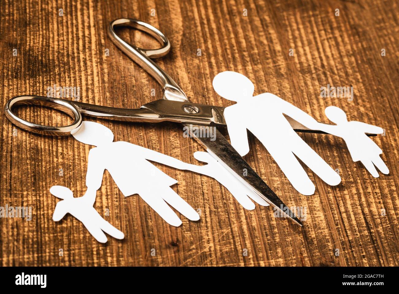 Scissors cutting paper cut of family. Broken family concept ,divorce ...