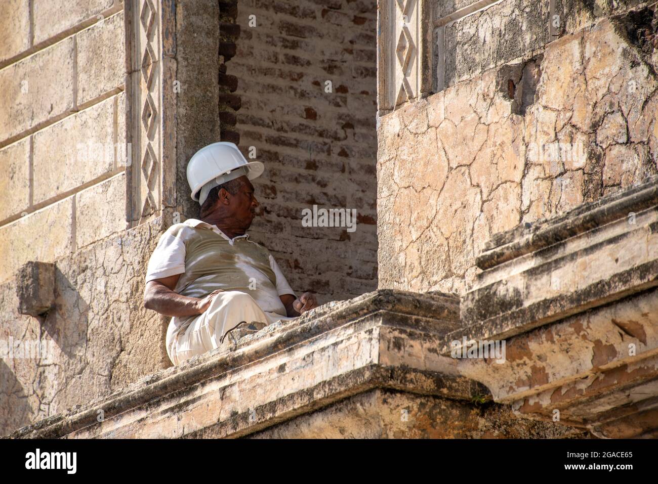 Senior Cuban man construction worker taking a break, Holguin, Cuba ...