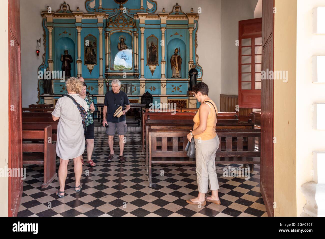 Tourists visiting colonial catholic church, Holguin, Cuba, 2016 Stock ...