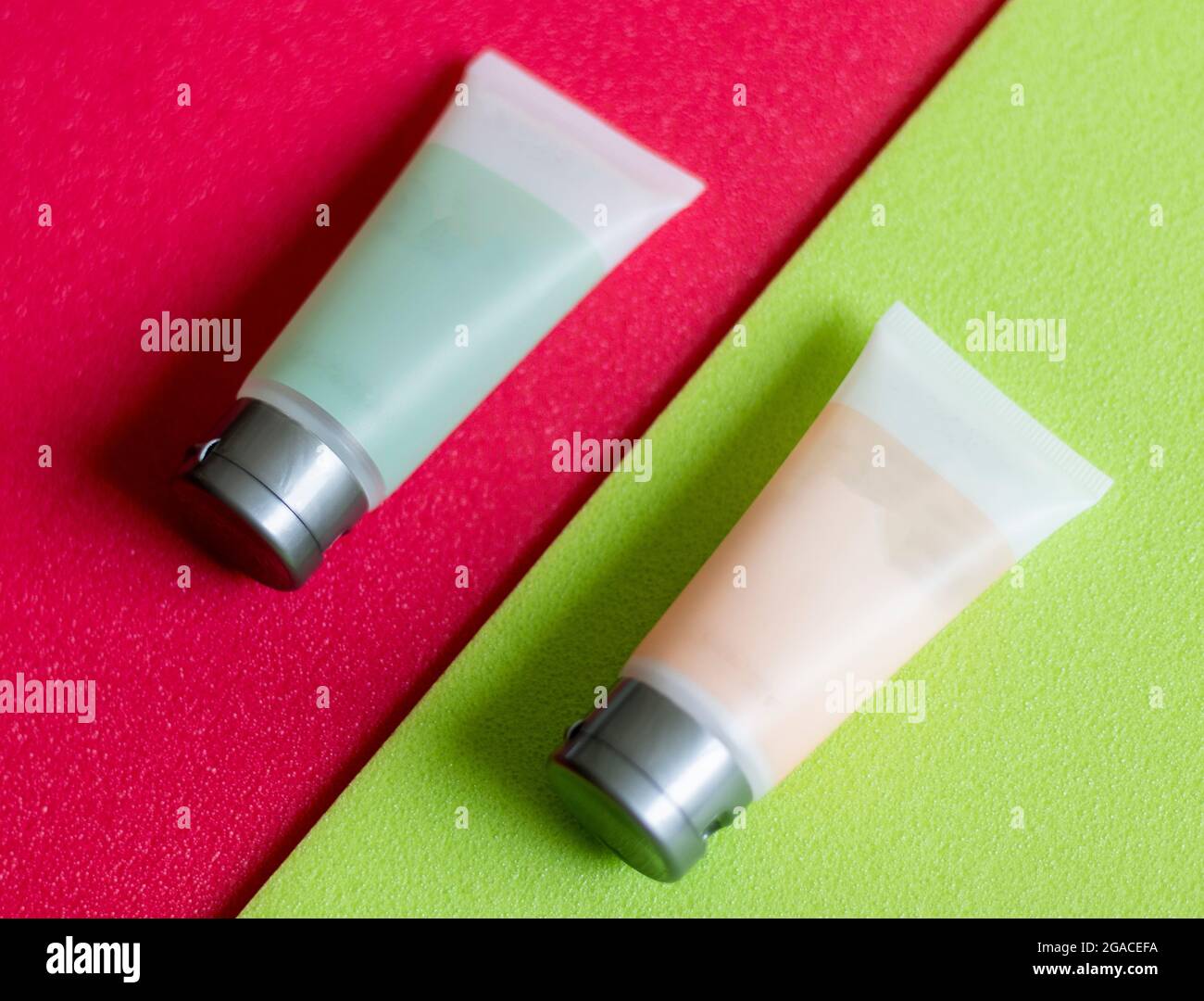 Close up shot of shampoo and body lotion tubes Stock Photo - Alamy