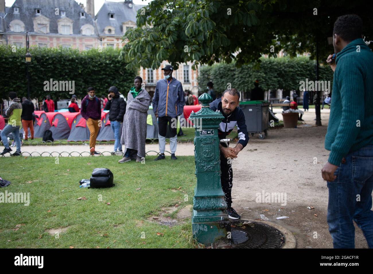 Homeless man in public fountain hi-res stock photography and images - Alamy