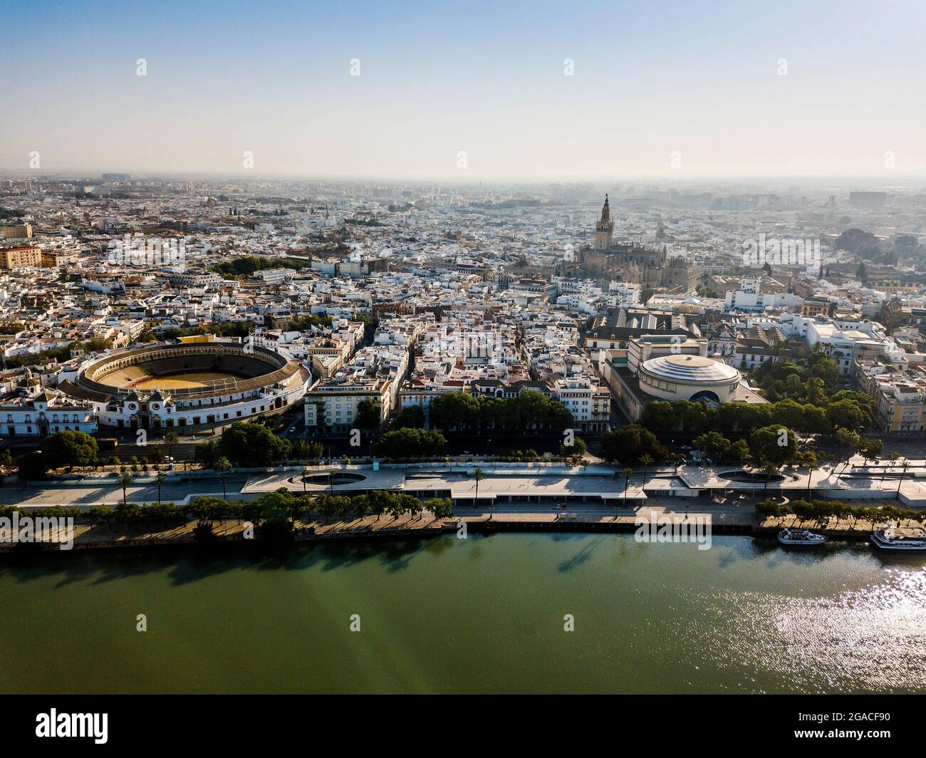 Aerial view of Seville with visible bullring and cathedral tower ...