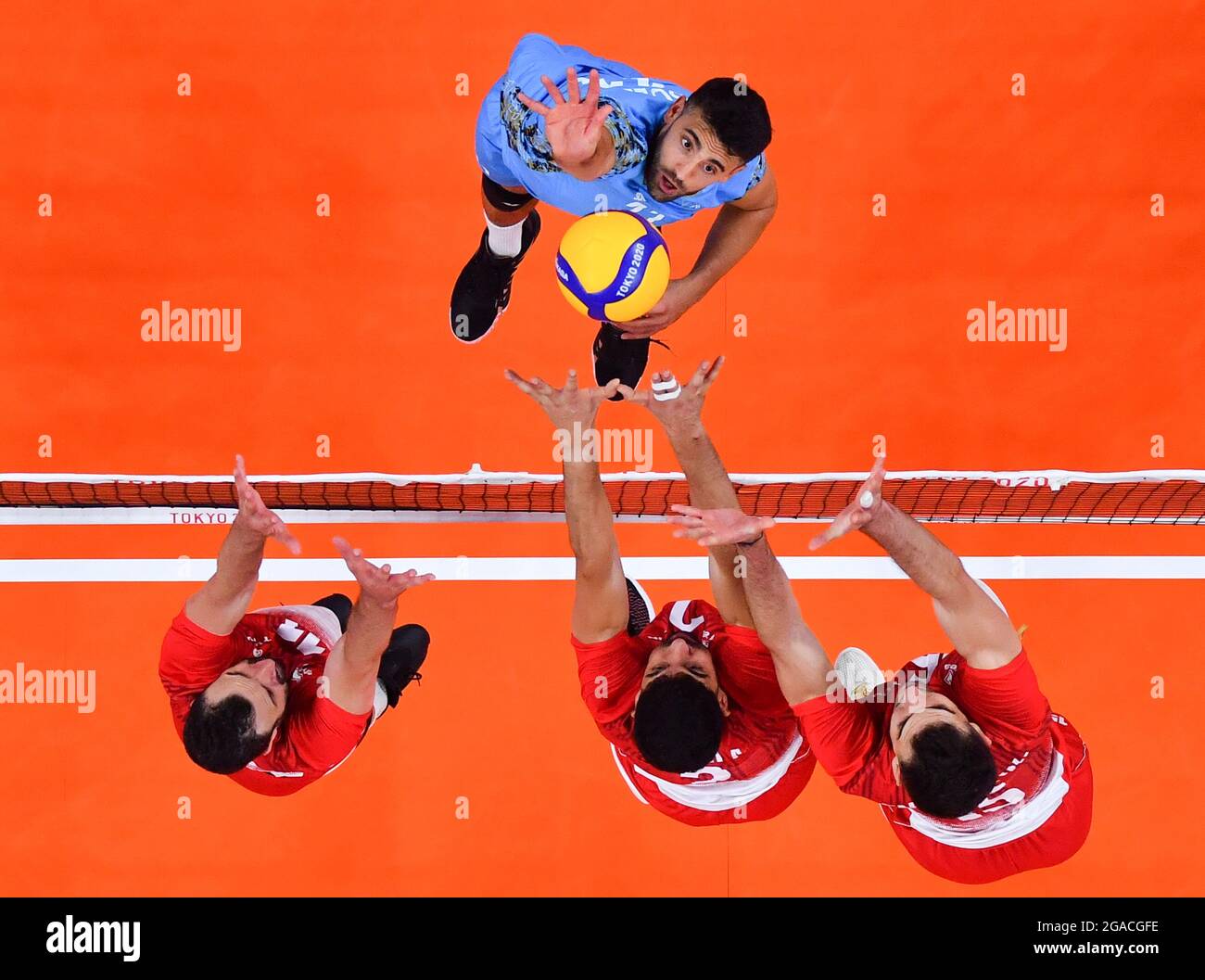 Tokyo, Japan. 30th July, 2021. Argentina's Sebastian Sole (up) spikes ...