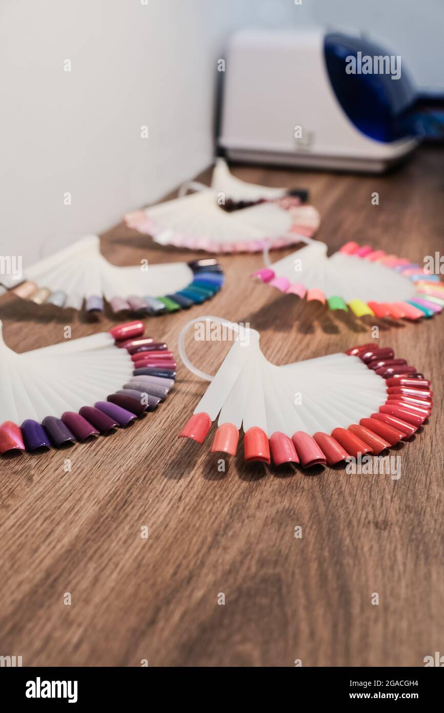 Nail polish samples in different colors. Nail acrylic lacquer manicure ...