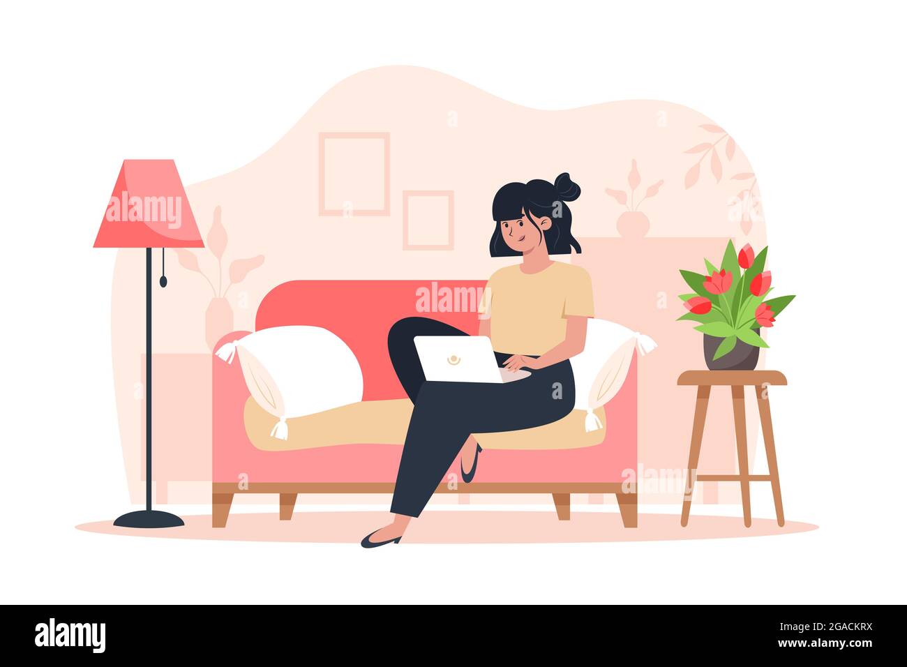 Young woman sitting on sofa and working on laptop from home Stock ...