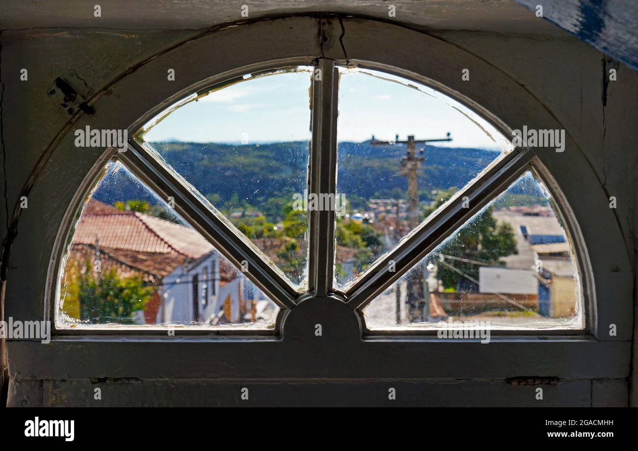Semicircular window (detail) with view of Diamantina city, Minas Gerais ...
