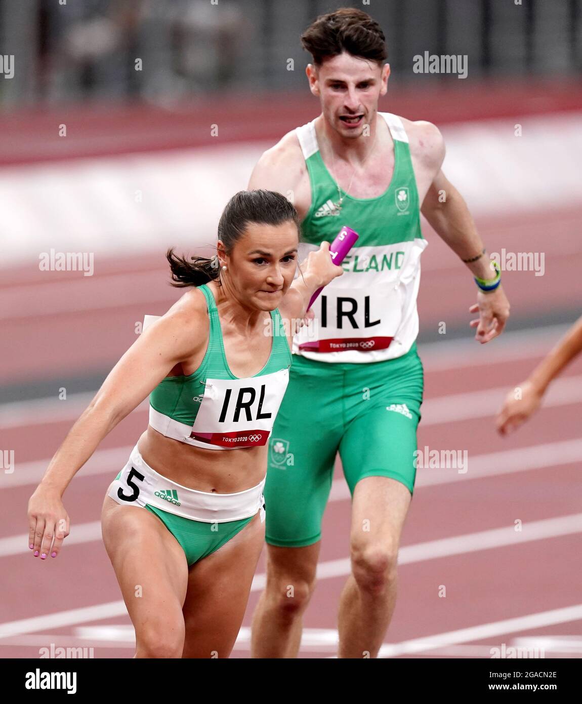Ireland's Cillin Greene (back) hands the baton to Phil Healy during the ...