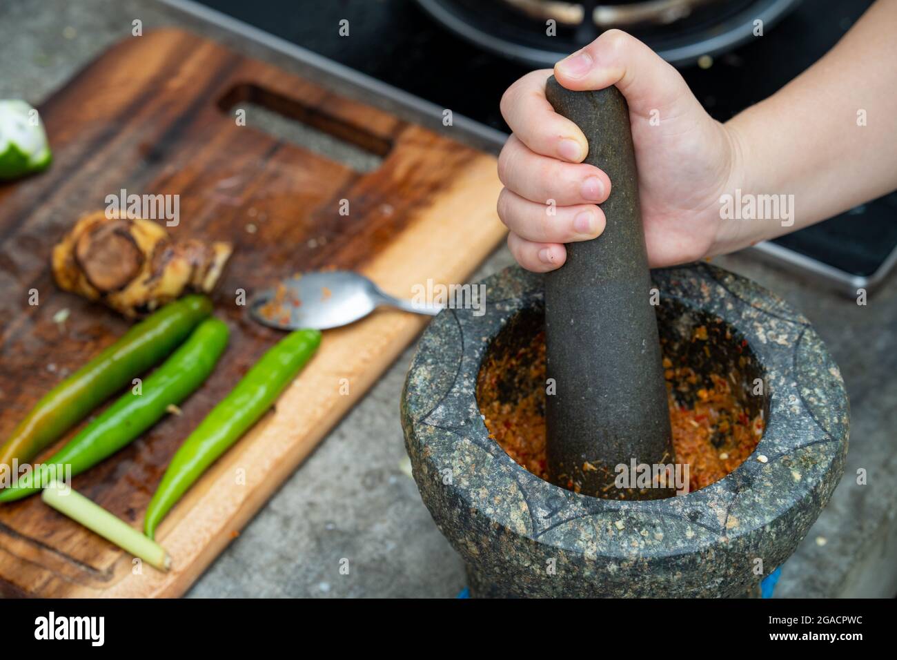 Closeup curry spices grinding in hi-res stock photography and images ...