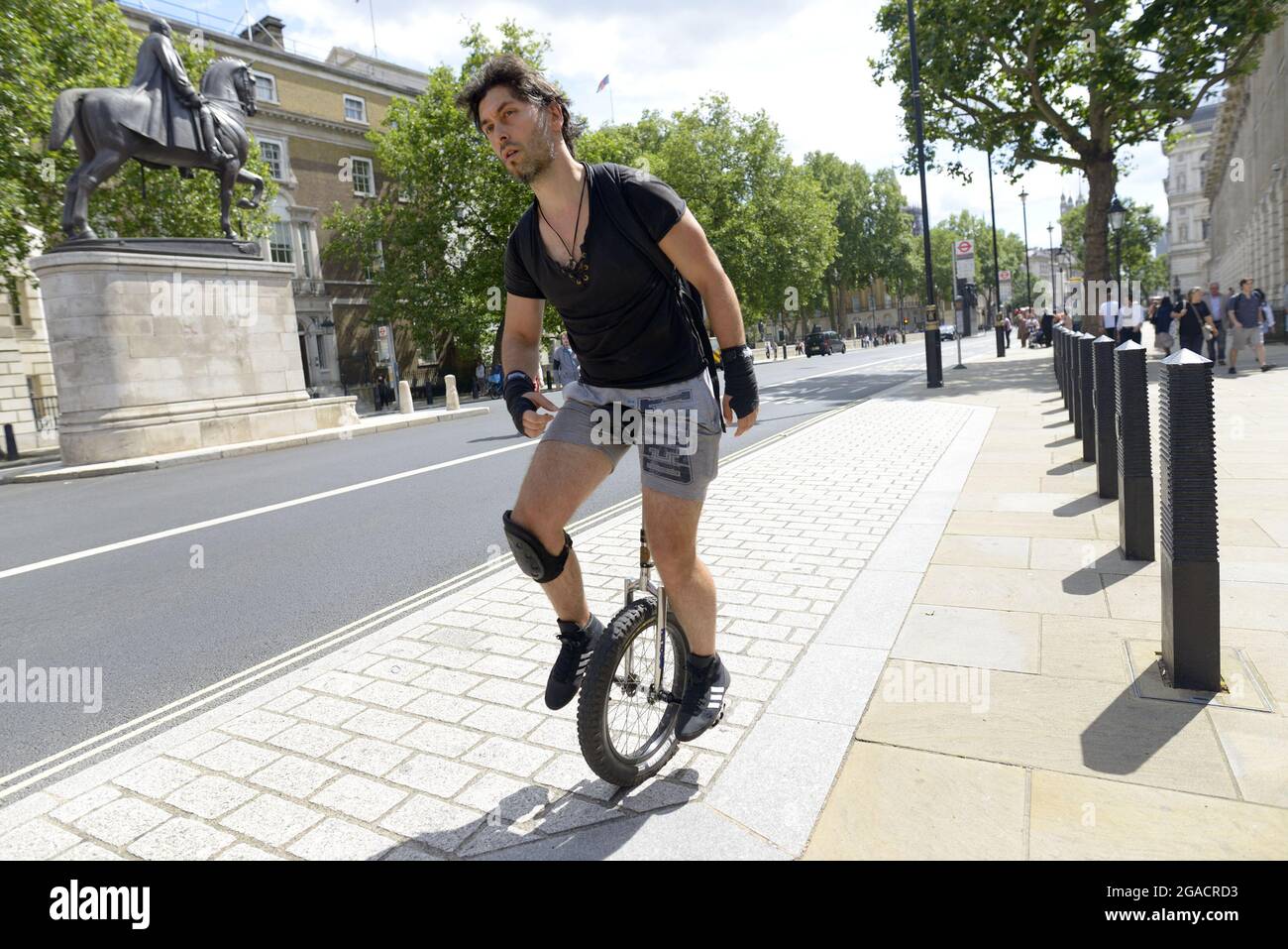 Man unicycle hi-res stock photography and images - Alamy