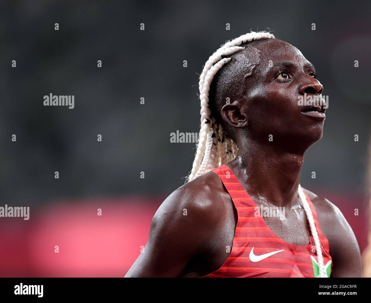 Tokyo, Japan. 30th July, 2021. Francine Niyonsaba of Burundi reacts ...