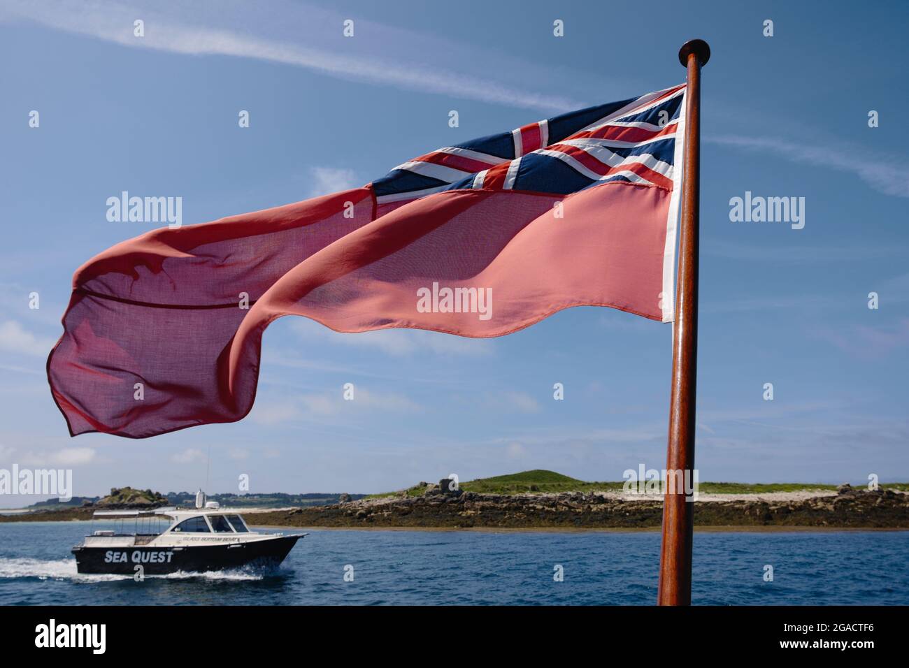 Red Ensign on the back of a ferry, St Martin's island, Isles of Scilly ...