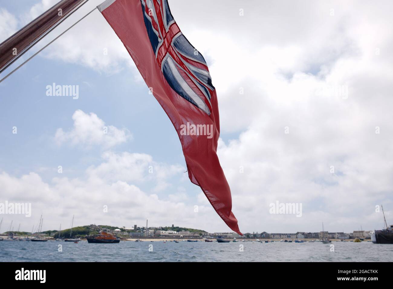 Red Ensign on the back of a ferry, St Mary's island, Isles of Scilly ...