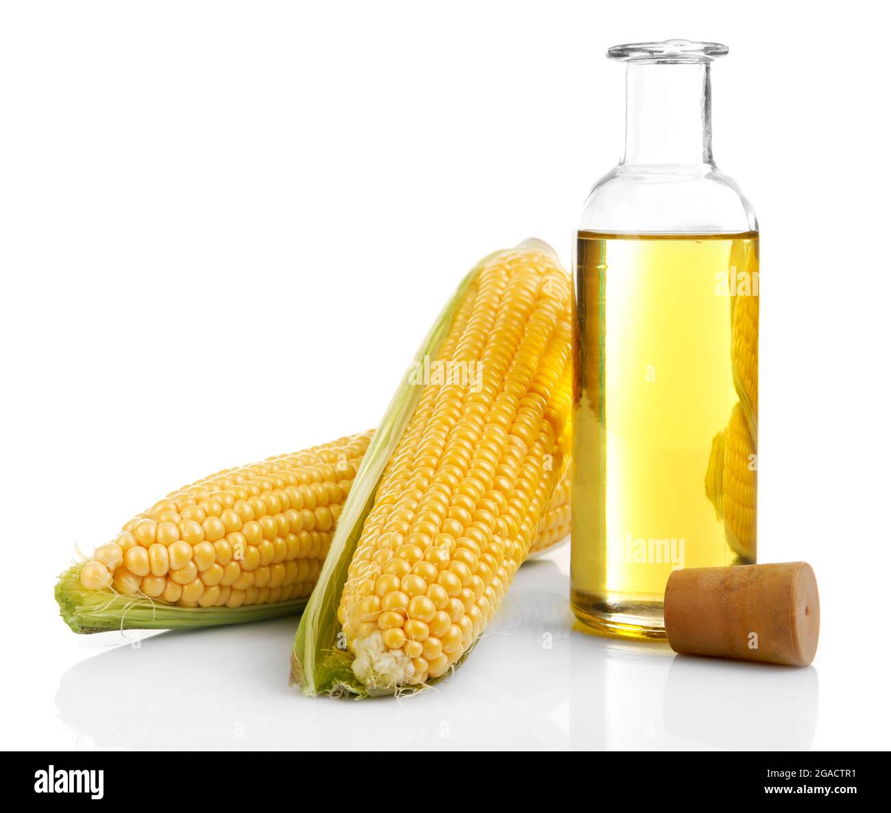 Fresh corn with bottle of oil isolated on white Stock Photo - Alamy
