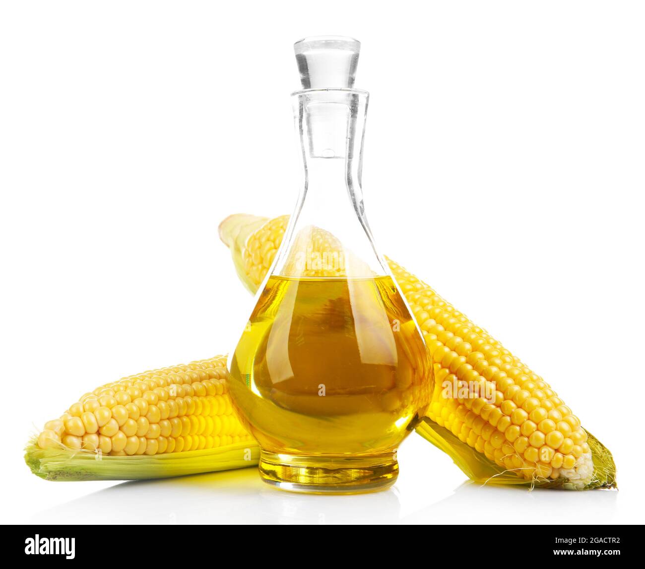 Fresh corn with bottle of oil isolated on white Stock Photo - Alamy