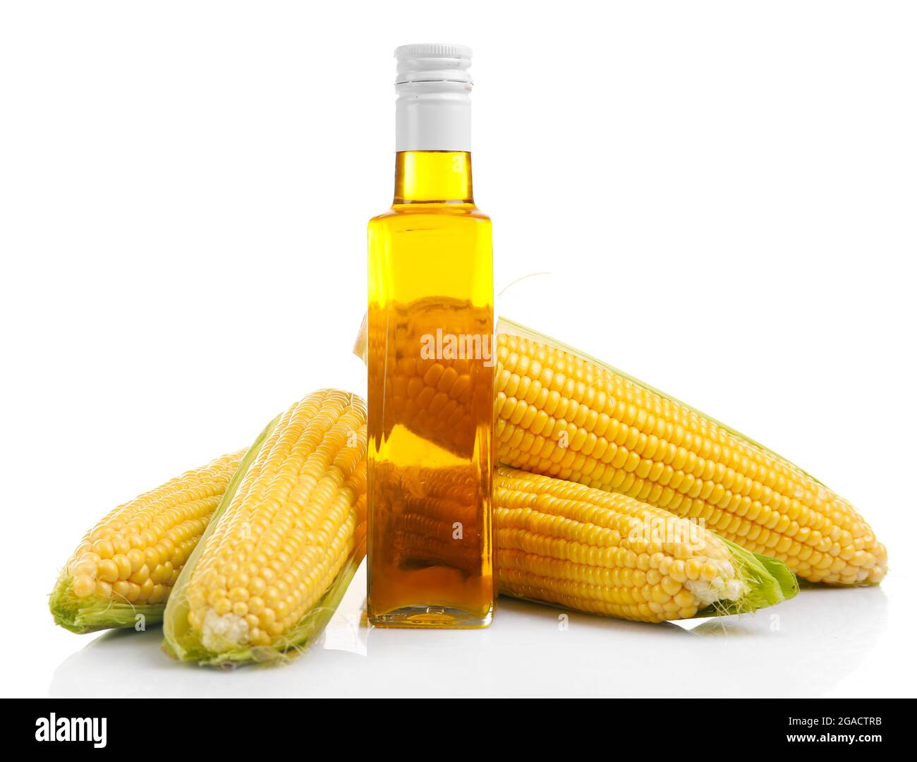 Fresh corn with bottle of oil isolated on white Stock Photo - Alamy
