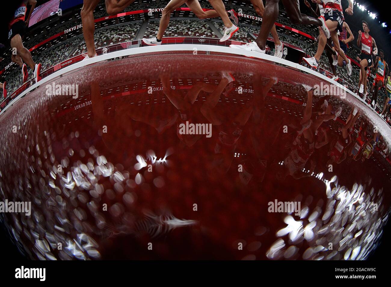 Tokyo, Japan. 30th July, 2021. Athletes compete during the men's 10000m ...